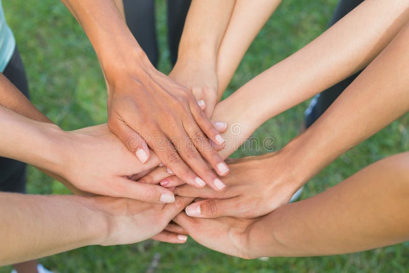 Hands Stacked upon One Another Stock Image - Image of unity, park: 37820363