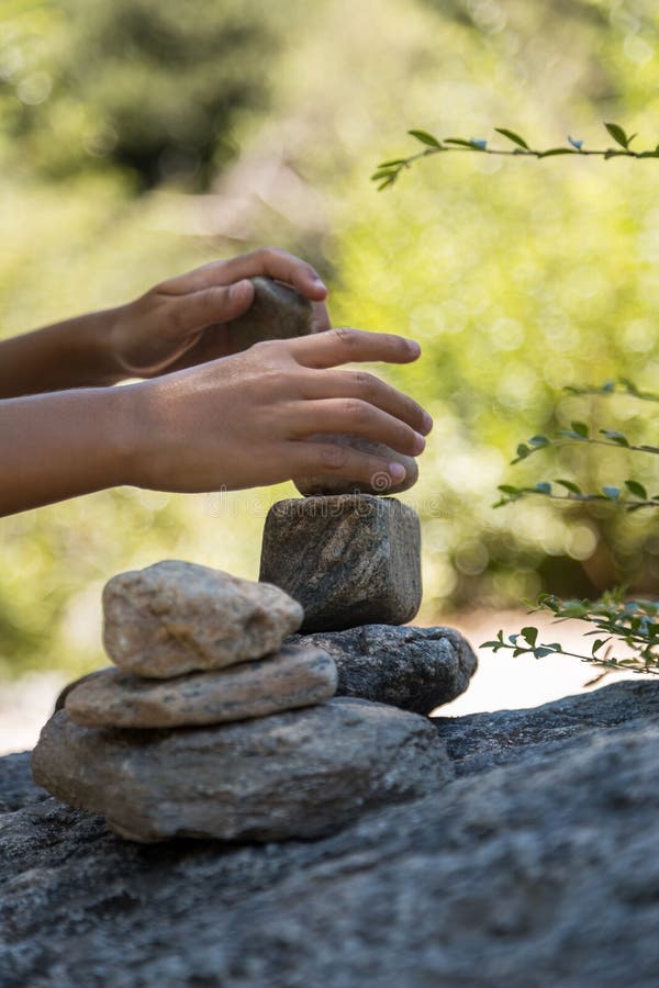 Hands Stacking Stones Outdoors Stock Photos - Free & Royalty-Free Stock ...