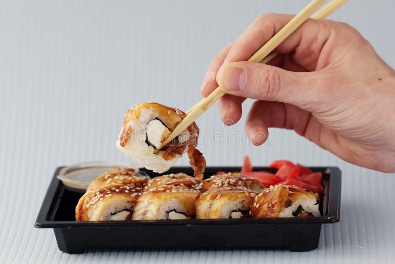 Hands sticks japan rolls stock photo. Image of healthy - 50289772