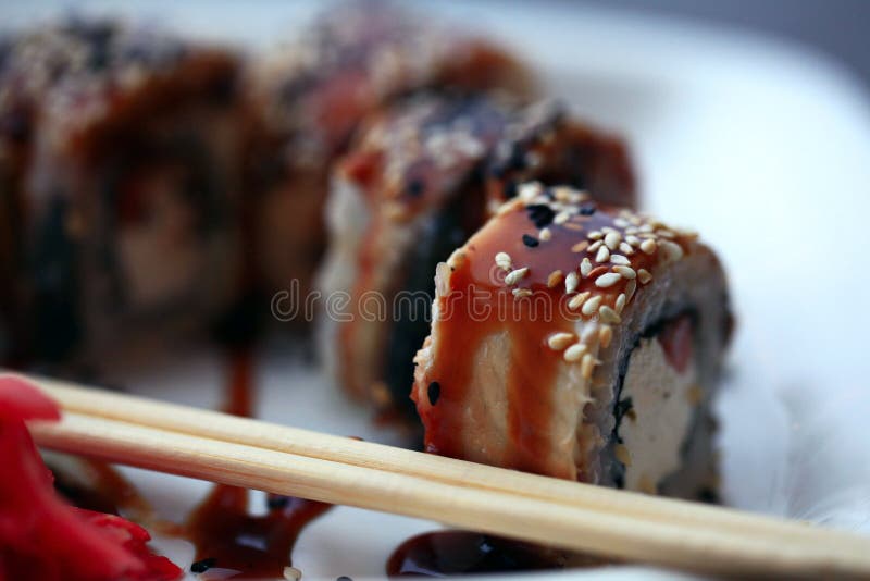 Hands sticks japan rolls stock image. Image of sauce - 50289799