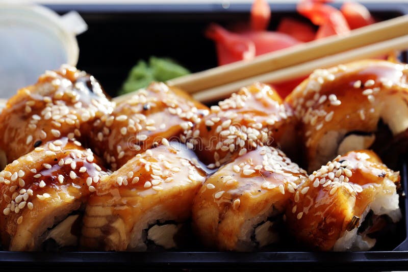 Hands sticks japan rolls stock image. Image of delicious - 50290807