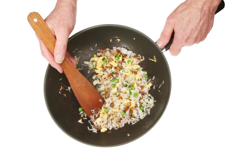 Hands stirring fried rice stock image. Image of isolated - 92601457