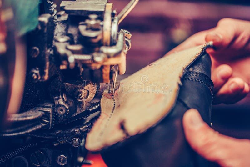 Hands Stitching a Part of the Shoe in a Shoe Factory Stock Image ...
