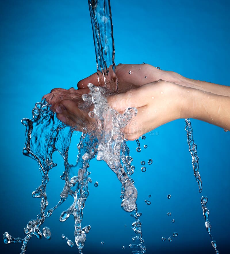 Hands and stream of water. stock image. Image of pouring - 7303101