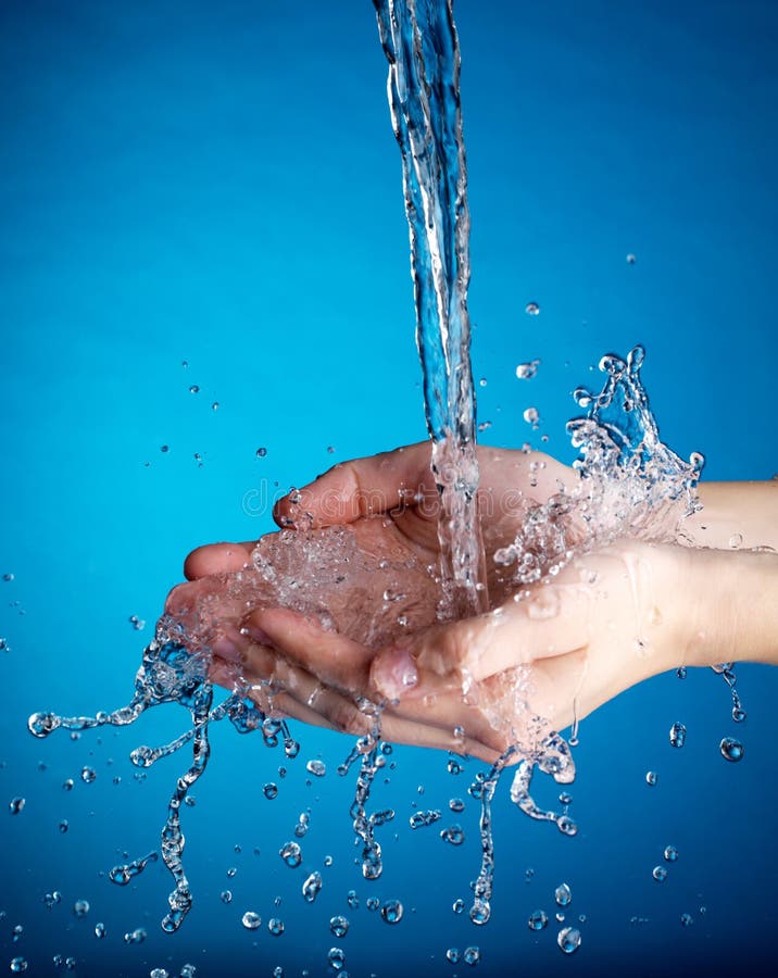 Hands and stream of water. stock photo. Image of drink - 7303402