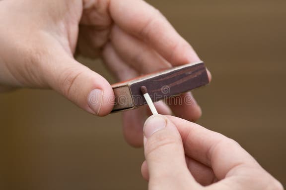 Hands striking a match stock image. Image of woman, striking - 72214925