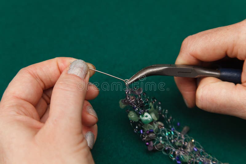 Hands Stringing Beads on a String. Needlework Stock Photo - Image of ...