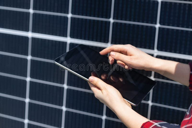 Hands with Tablet on a Background of Solar Panels Stock Photo - Image ...