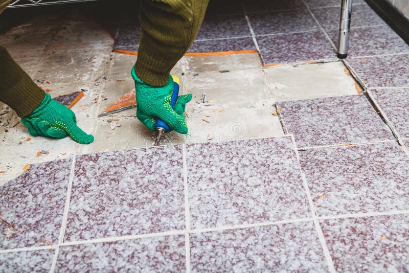 Hands Take Tile with Chisel Stock Photo - Image of security, crack ...