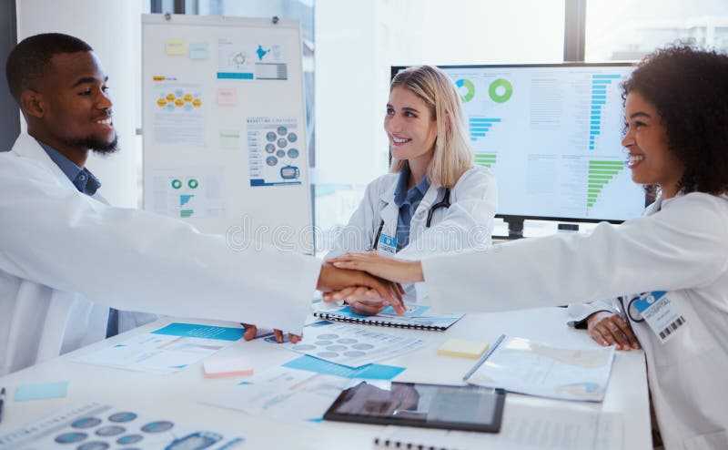 Hands, Teamwork and Planning of Doctors with Charts, Graphs or ...