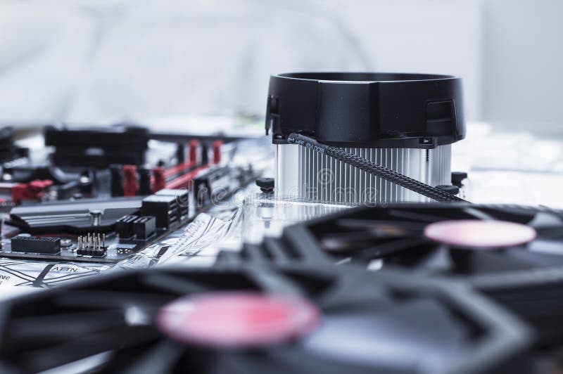 Hands Of A Technician Assembling Computer Hardware Parts New Cpu Is Being Mounted Unto The