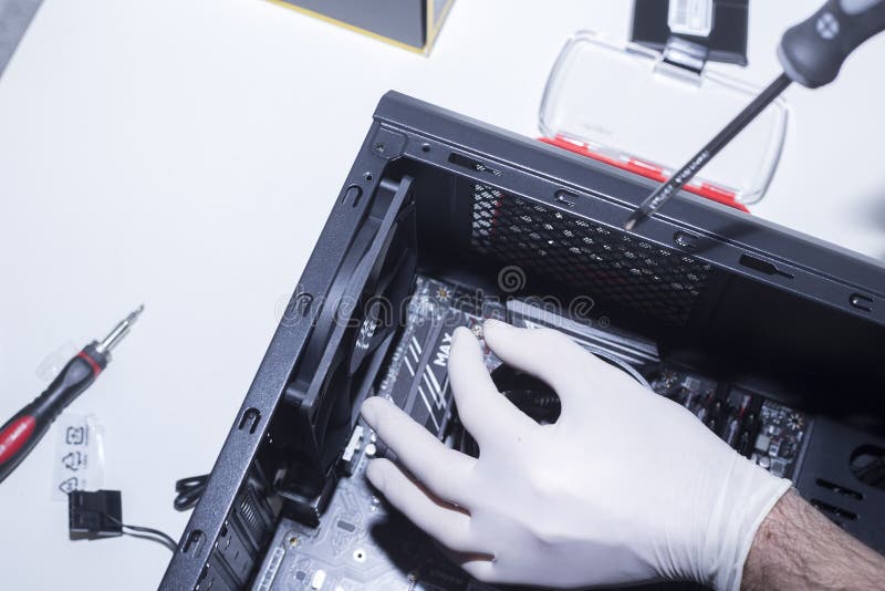 Hands of a Technician Assembling Computer Hardware Parts New Cpu is ...