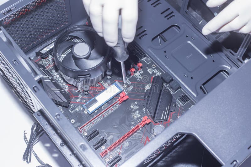 Hands Of A Technician Assembling Computer Hardware Parts New Cpu Is Being Mounted Unto The