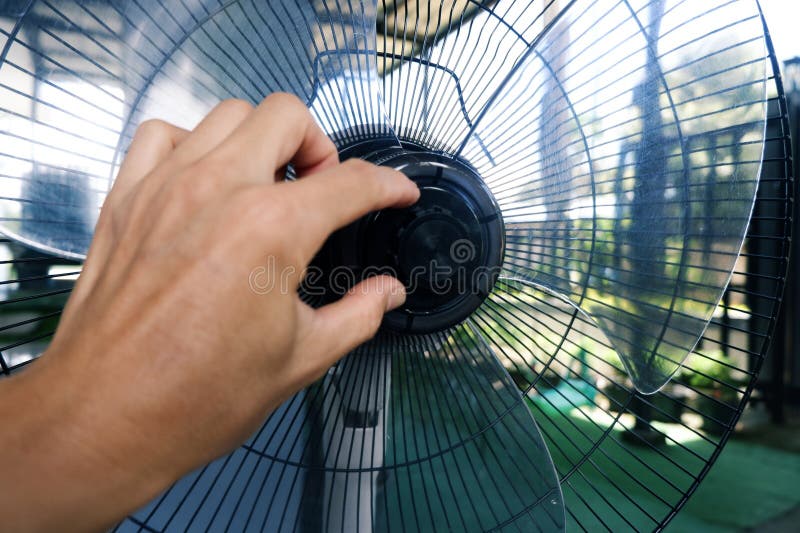 Hands of a Technician Repairing a Fan, Replacing Capacitors, Checking ...