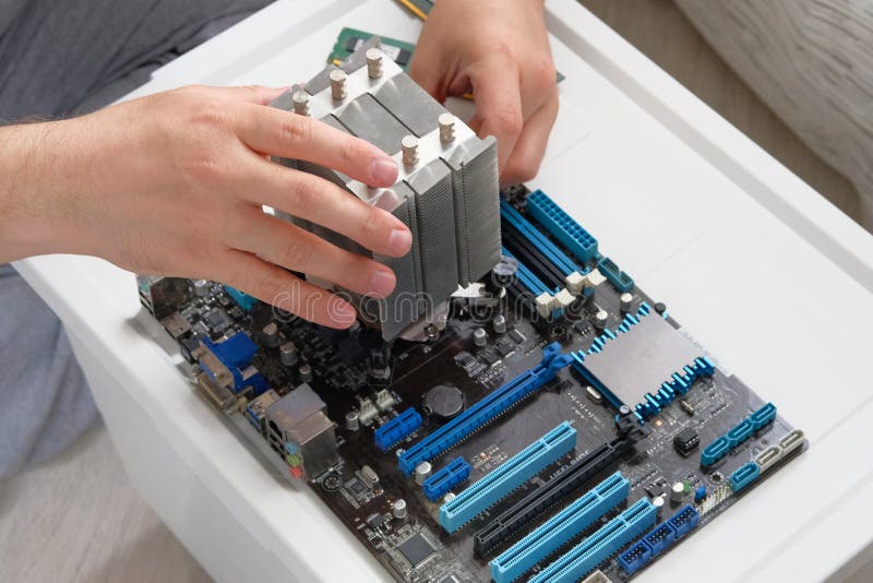 Hands of Technician is Repairing PC. Service Electronics and Computers ...
