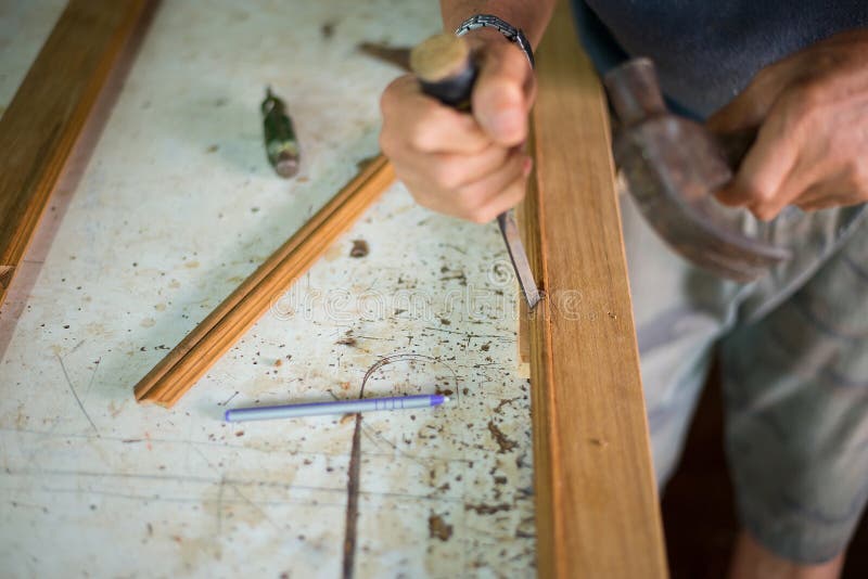 Hands of Technicians at Work Repairing Woodwork Stock Image - Image of ...