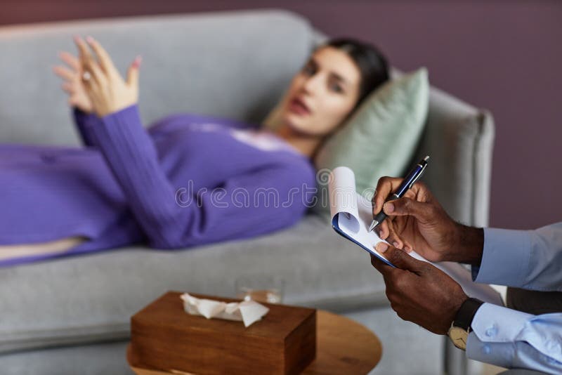 Therapist Taking Notes stock image. Image of document - 268522111