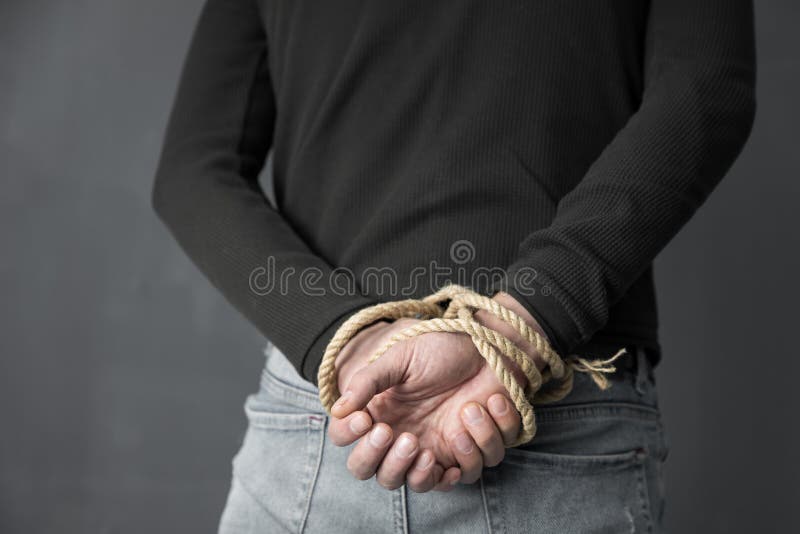 Hands tied up with rope stock image. Image of emotional - 193990623