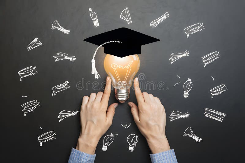 Hands Touching Light Bulb with Graduation Hat, Symbolizing Education ...