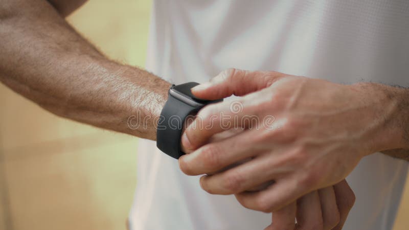 Hands Touching Smart Watch Close Up. Athlete Check Performance Data on ...