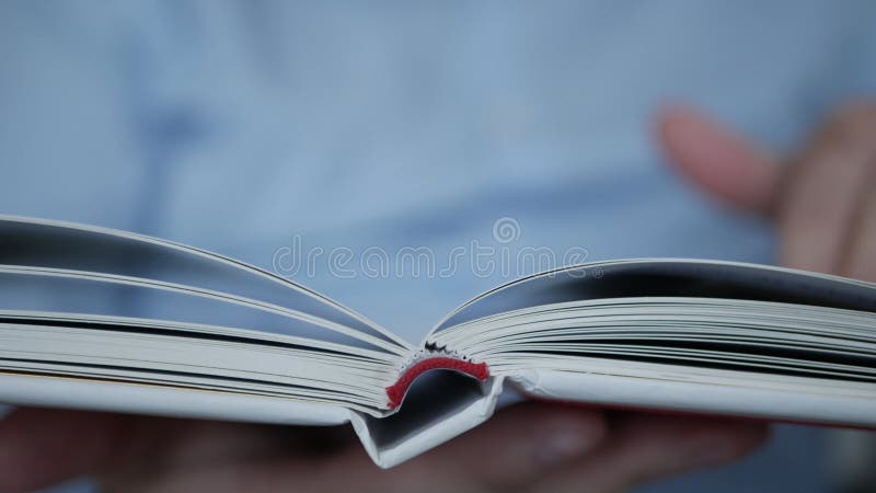 Hands Turning the Pages of a Book. One Person Reading, and Learning ...