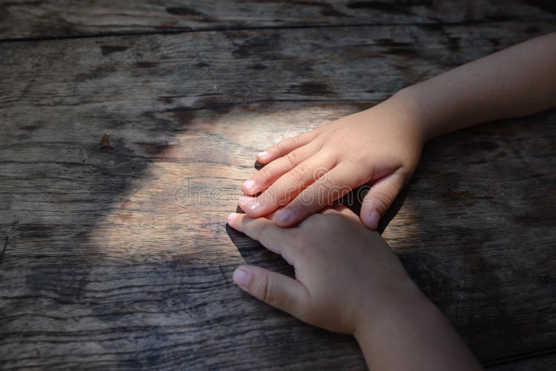 The Hands of Two Children are Gently Touching Stock Photo - Image of ...