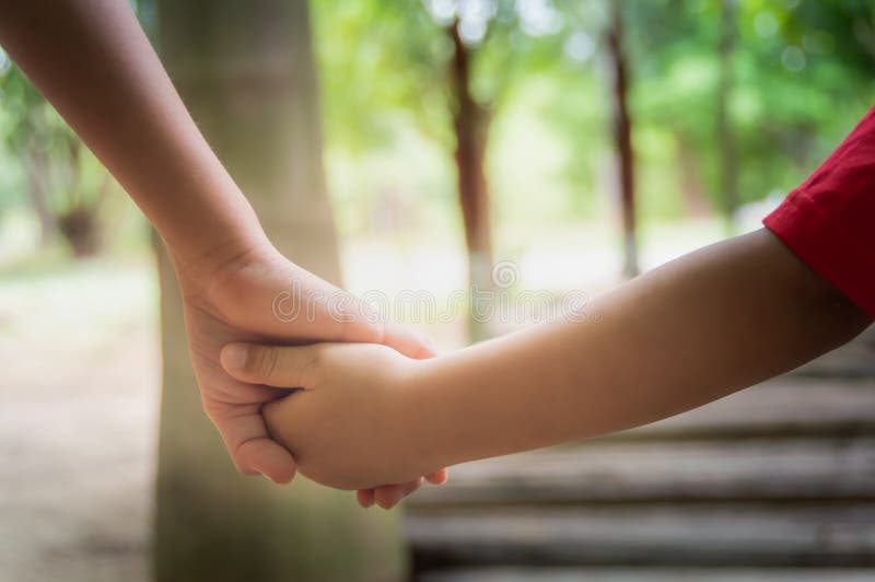 The Hands of Two Children Which Hand in Hand Stock Photo - Image of ...