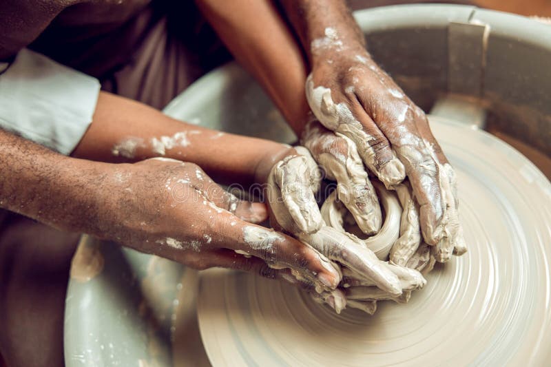 Hands of Two People Making a New Pottery Product Together Stock Photo ...