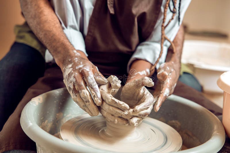 Hands of Two People Making a New Pottery Product Together Stock Photo ...