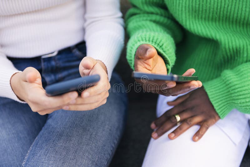 Hands of Two Women Using Mobile Phone Stock Image - Image of internet ...