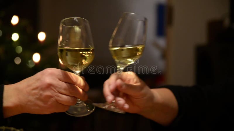 Hands with Two Yellow Wine Glass Cheering Stock Video - Video of glass ...