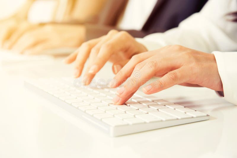 Hands Typing on Computer Keyboards Stock Photo - Image of team, modern ...