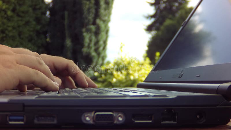 Hands Typing so a Laptop Keyboard that the Computer is Moving ...