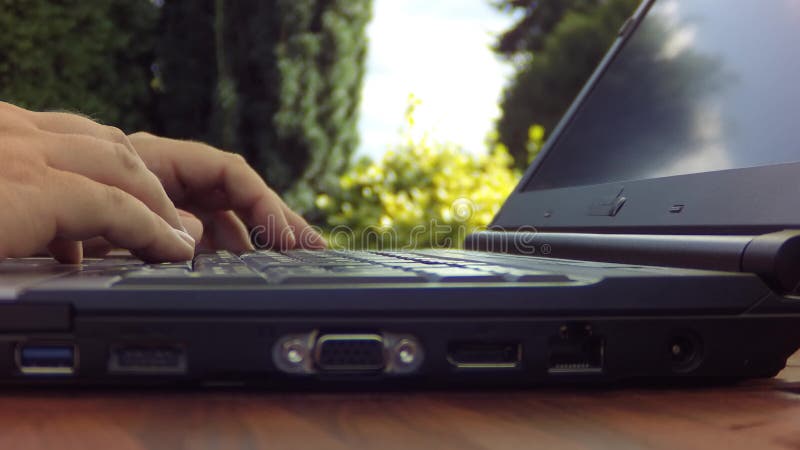 Hands Typing so a Laptop Keyboard that the Computer is Moving ...
