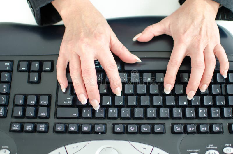 Hands typing on a keyboard stock image. Image of person - 45395223