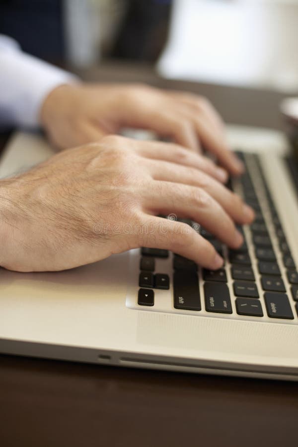 Hands typing on laptop stock image. Image of occupation - 197836501