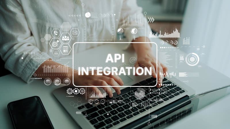 Hands Typing on Laptop with API Integration Concept and Digital Data Analysis Graphics for ...