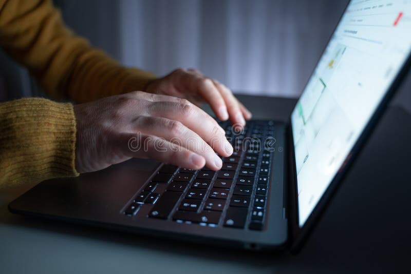 Hands Typing on Laptop Keyboard in the Dark Stock Photo - Image of ...