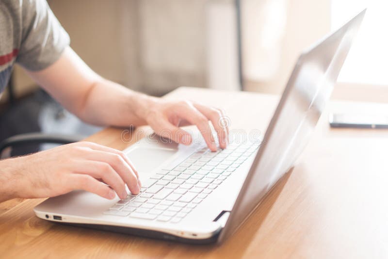 Hands Typing on a Notebook Closeup. Workplace Stock Image - Image of ...
