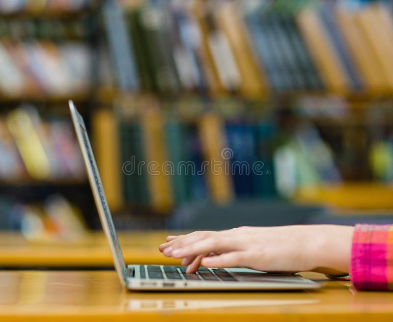 Hands Typing on Notebook in Library Stock Image - Image of finger ...