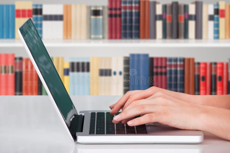 Hands Typing on Notebook in Library Stock Image - Image of lessons ...