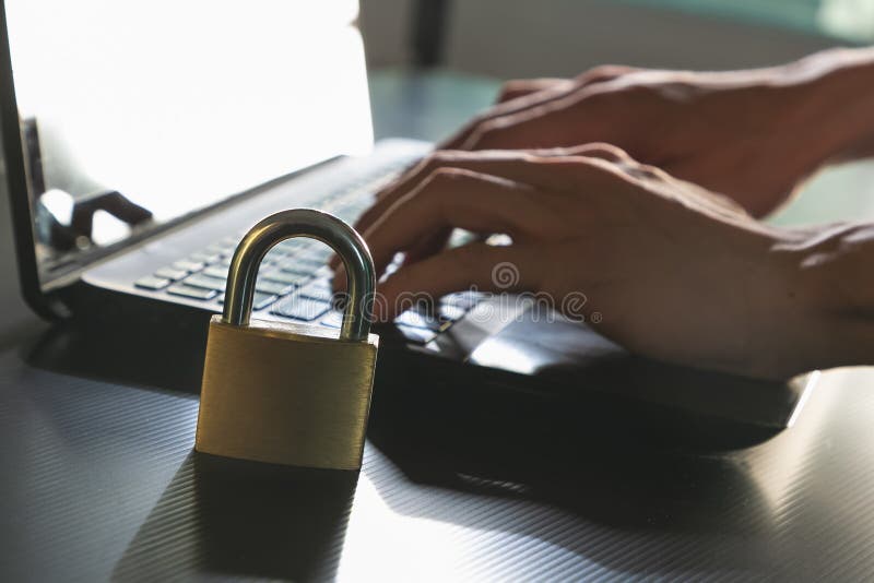 Hands Typing Over the Keyboard on Laptop. Padlock on Laptop Computer ...