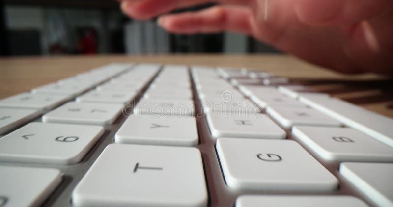 Hands Typing on Remote Wireless Computer Keyboard in Office Workplace ...