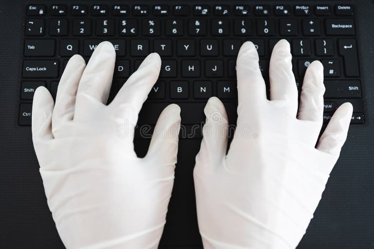 Hands Typing on Shared Computer Keyboard at Work Wearing Disposable ...
