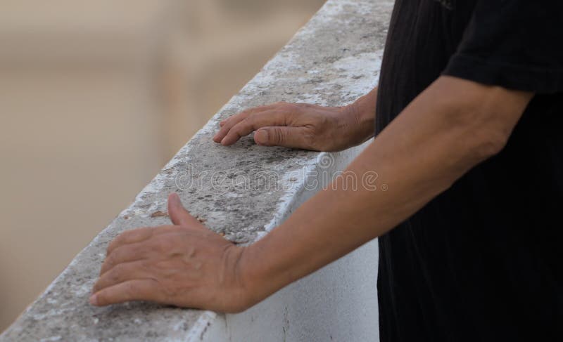 Hands of an Unidentified Senior Male on Cement Railing Stock Photo ...