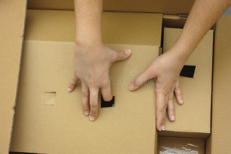Hands Unpacking Big Cardboard Box Stock Image - Image of hand, opening ...