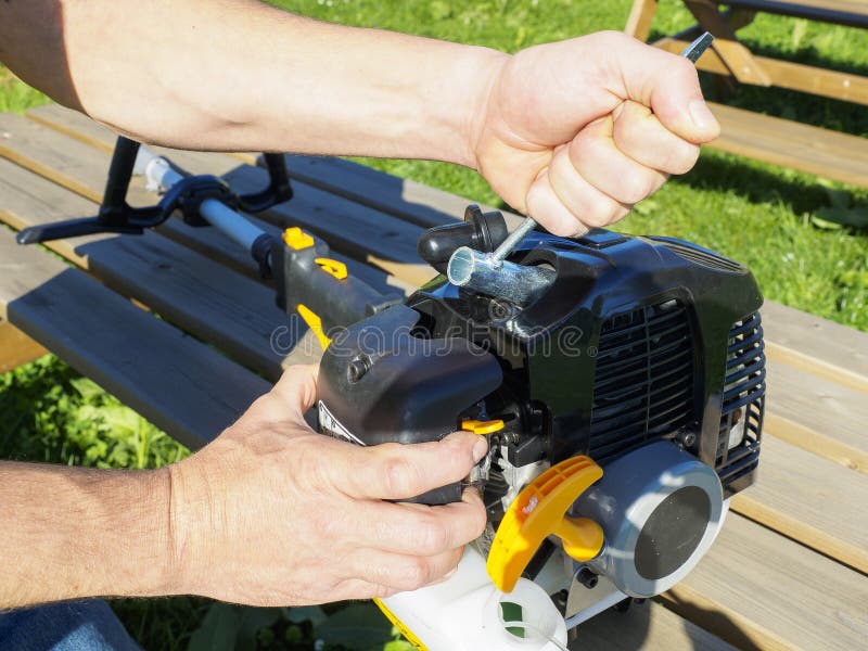 Hands of an Unrecognizable Person Performing Fine-tuning Work on Garden ...