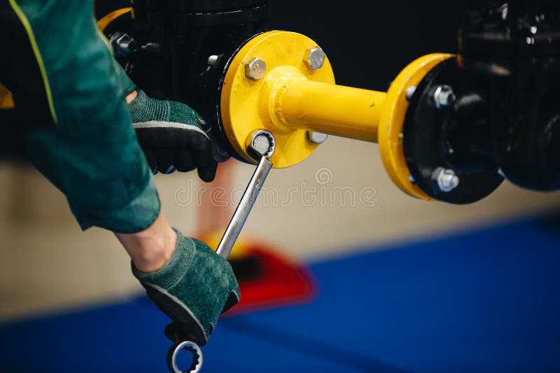 Hands Unscrew the Nut on the Pipe Stock Image - Image of spanner, iron ...