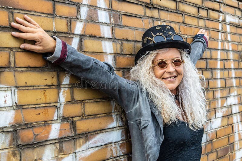 Hands up stock photo. Image of brick, female, attractive - 253379216