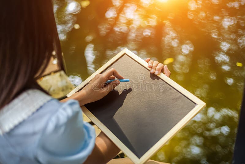 Hands Use Chalk for Drawing, Writing Balckboard in the Parks. Education ...